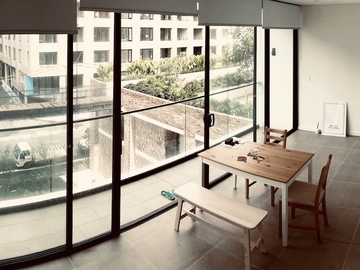 View of an interesting bridge from a residential living room | Skoutli