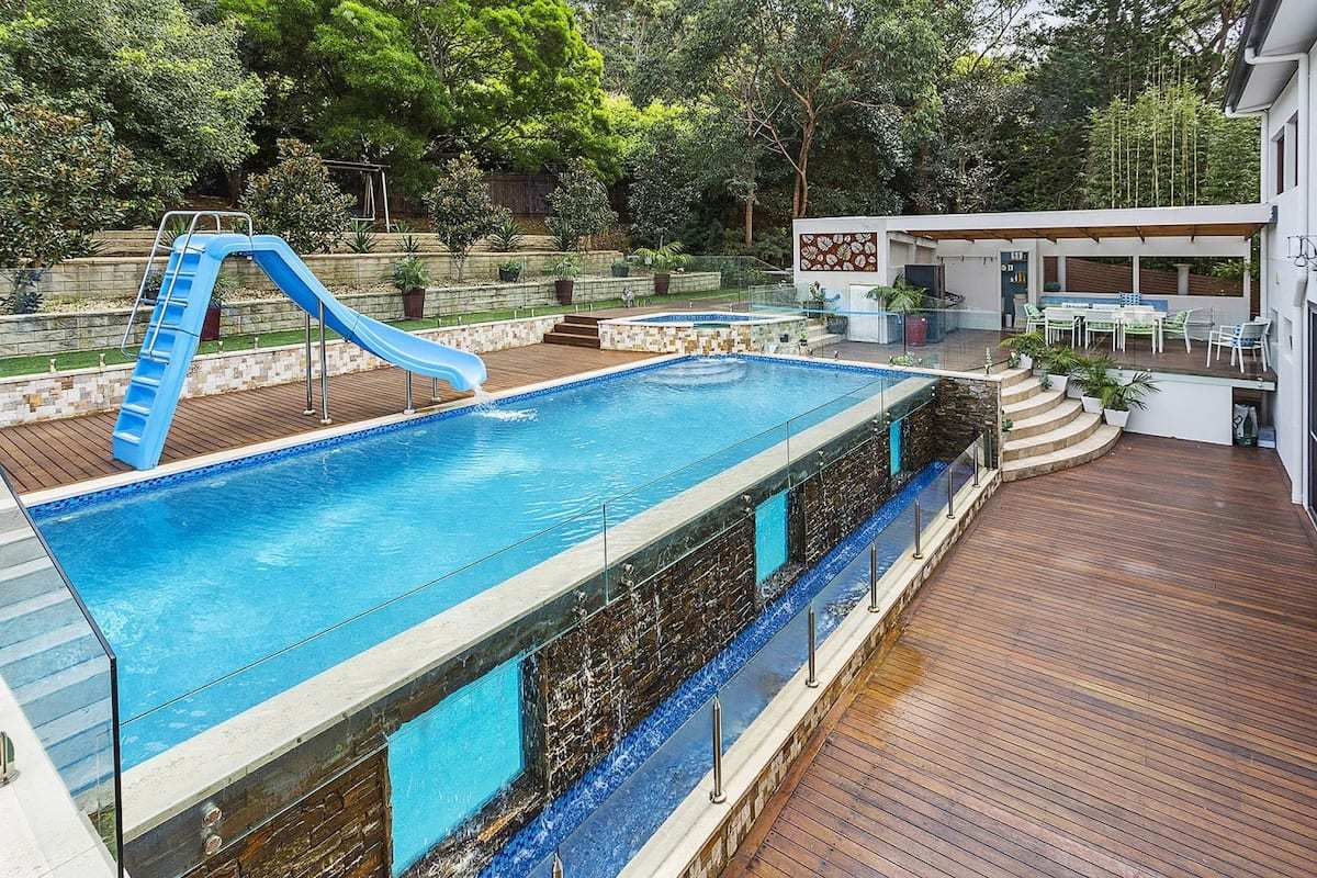 Resort-Style Pool with Waterslide, Infinity Edge and Spa | Skoutli